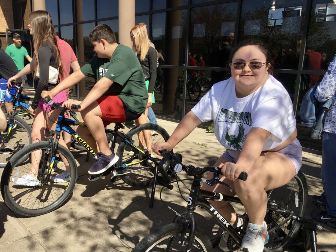 ‘All eyes on them’: Lawrence students swim, bike and run as part of adaptive triathlon | News ...